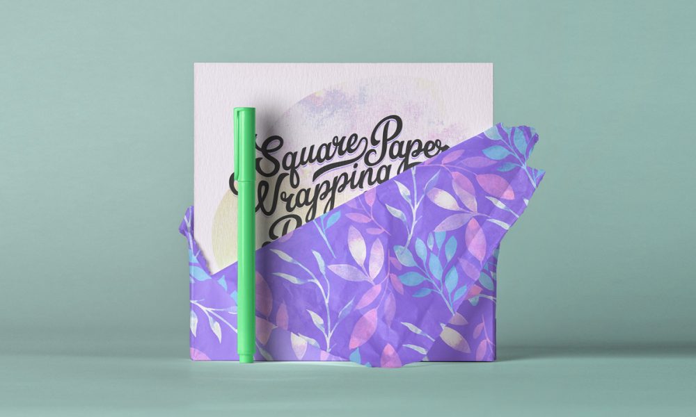 Free Modern Paper Wrapped Square Greeting Card Mockup - Mockup Planet
